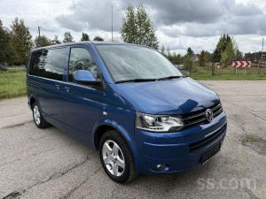 Blue Volkswagen Multivan 2014 in Ogre, with an engine capacity of 2.00 L and mileage of 269 thousand km for 14799 €, photo 4 on AUTOMOTO.COM.LV