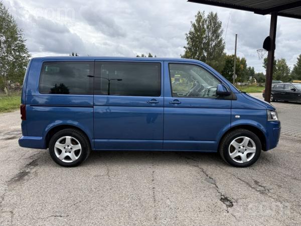 Blue Volkswagen Multivan 2014 in Ogre, with an engine capacity of 2.00 L and mileage of 269 thousand km for 14799 €, photo 7 on AUTOMOTO.COM.LV