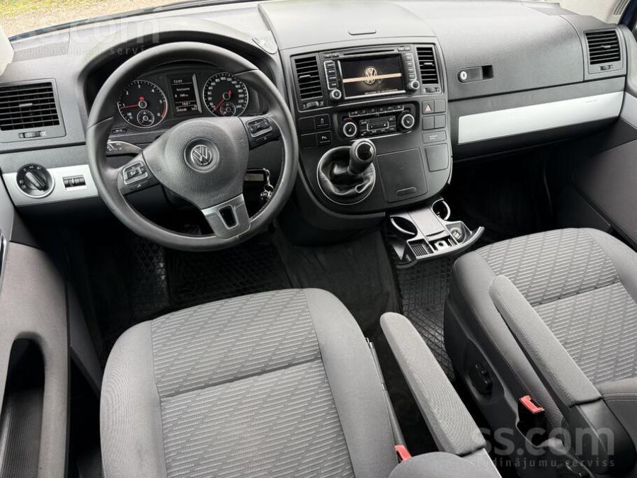 Blue Volkswagen Multivan 2014 in Ogre, with an engine capacity of 2.00 L and mileage of 269 thousand km for 14799 €, photo 12 on AUTOMOTO.COM.LV