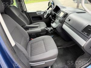 Blue Volkswagen Multivan 2014 in Ogre, with an engine capacity of 2.00 L and mileage of 269 thousand km for 14799 €, photo 13 on AUTOMOTO.COM.LV