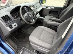 Blue Volkswagen Multivan 2014 in Ogre, with an engine capacity of 2.00 L and mileage of 269 thousand km for 14799 €, photo 14 on AUTOMOTO.COM.LV