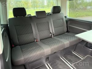 Blue Volkswagen Multivan 2014 in Ogre, with an engine capacity of 2.00 L and mileage of 269 thousand km for 14799 €, photo 15 on AUTOMOTO.COM.LV