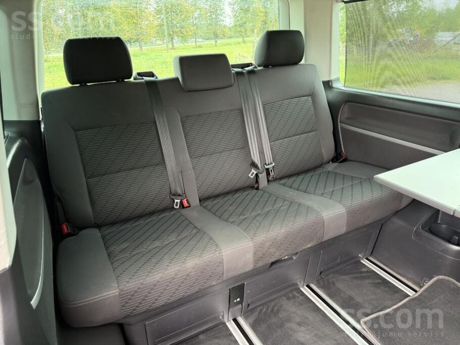 Blue Volkswagen Multivan 2014 in Ogre, with an engine capacity of 2.00 L and mileage of 269 thousand km for 14799 €, photo 15 on AUTOMOTO.COM.LV