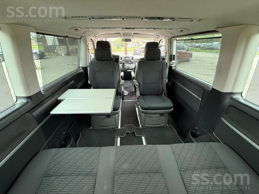 Blue Volkswagen Multivan 2014 in Ogre, with an engine capacity of 2.00 L and mileage of 269 thousand km for 14799 €, photo 16 on AUTOMOTO.COM.LV