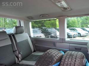 Blue Volkswagen Multivan 2010 in Cesis, with an engine capacity of 2.00 L and mileage of 235 thousand km for 13900 €, photo 18 on AUTOMOTO.COM.LV