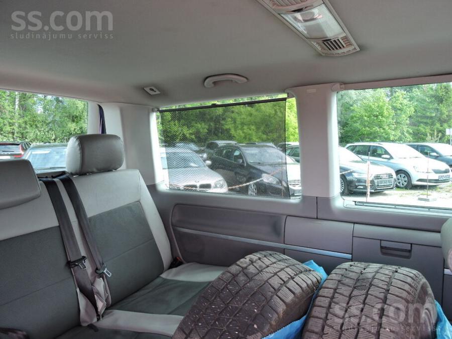 Blue Volkswagen Multivan 2010 in Cesis, with an engine capacity of 2.00 L and mileage of 235 thousand km for 13900 €, photo 18 on AUTOMOTO.COM.LV