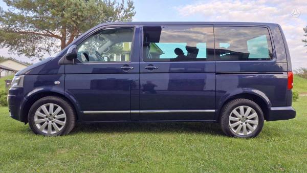 Blue Volkswagen Multivan 2014 in Ignalina, with an engine capacity of 2.00 L and mileage of 210 thousand km for 17800 €, photo 8 on AUTOMOTO.COM.LV