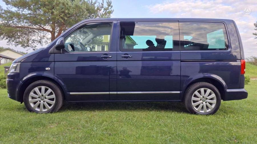 Zils Volkswagen Multivan 2014 Ignalina, ar dzinēja tilpumu 2.00 L un nobraukumu 210 tūkst. km par 17800 €, foto 8 vietnē AUTOMOTO.COM.LV