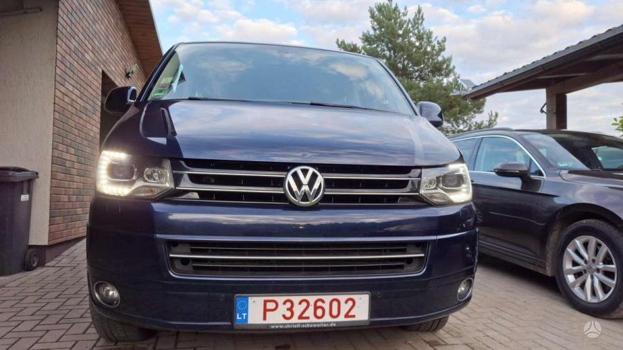 Zils Volkswagen Multivan 2014 Ignalina, ar dzinēja tilpumu 2.00 L un nobraukumu 210 tūkst. km par 17800 €, foto 25 vietnē AUTOMOTO.COM.LV