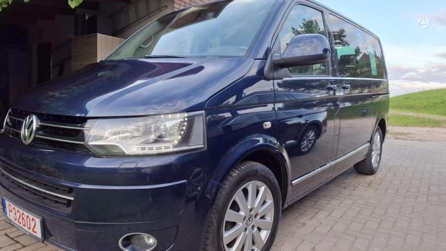 Zils Volkswagen Multivan 2014 Ignalina, ar dzinēja tilpumu 2.00 L un nobraukumu 210 tūkst. km par 17800 €, foto 26 vietnē AUTOMOTO.COM.LV