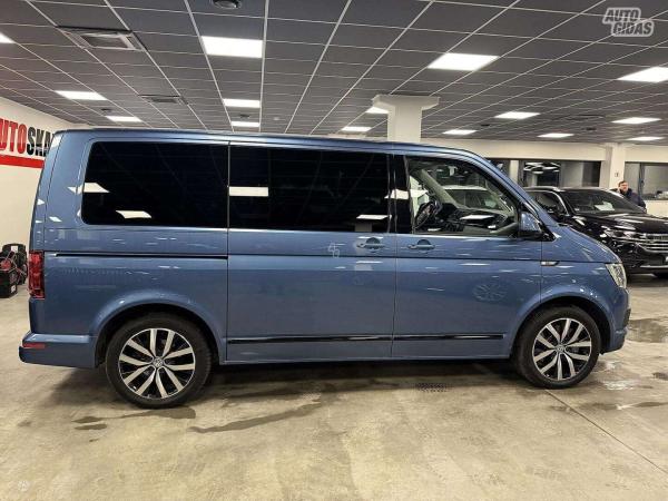 Blue Volkswagen Multivan 2016 in Klaipeda, with an engine capacity of 2.00 L and mileage of 299 thousand km for 24900 €, photo 3 on AUTOMOTO.COM.LV