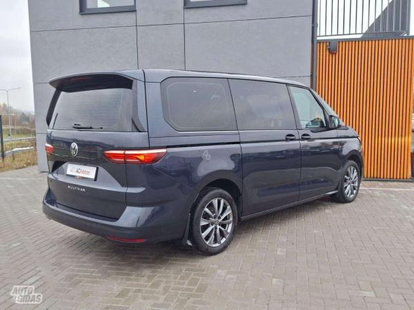 Blue Volkswagen Multivan 2023 in Vilnius, with an engine capacity of 2.00 L and mileage of 185 thousand km for 40990 €, photo 4 on AUTOMOTO.COM.LV