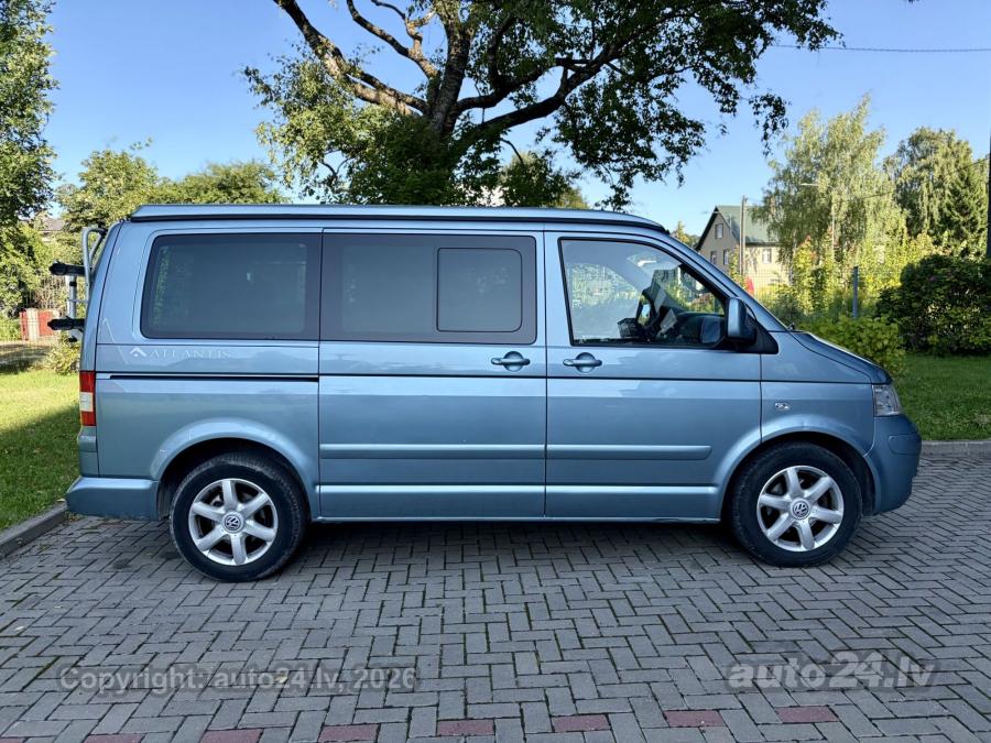 Zils Volkswagen Multivan 2007 Tartu, ar dzinēja tilpumu 2.50 L un nobraukumu 354 tūkst. km par 13000 €, foto 4 vietnē AUTOMOTO.COM.LV