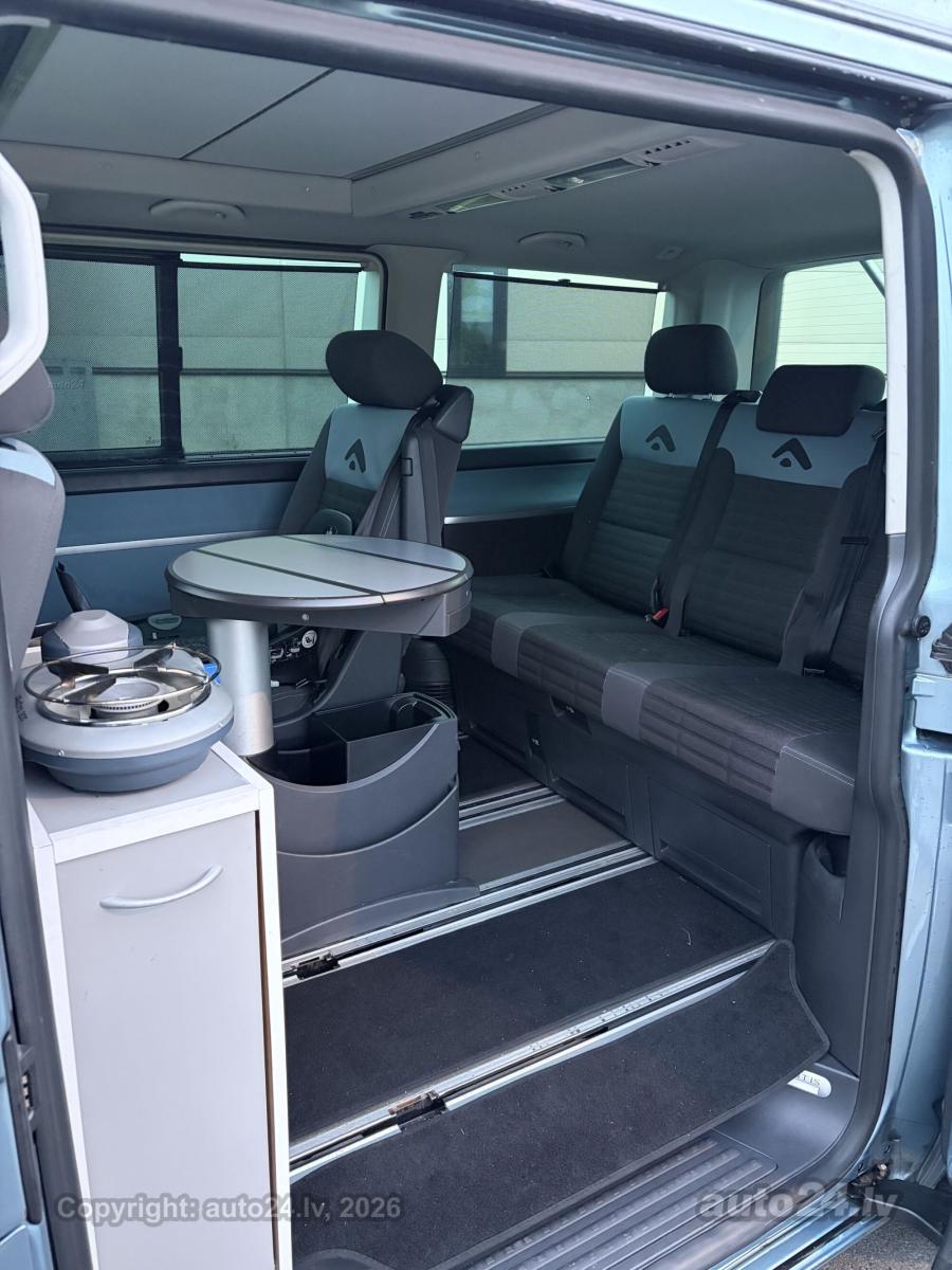 Zils Volkswagen Multivan 2007 Tartu, ar dzinēja tilpumu 2.50 L un nobraukumu 354 tūkst. km par 13000 €, foto 24 vietnē AUTOMOTO.COM.LV