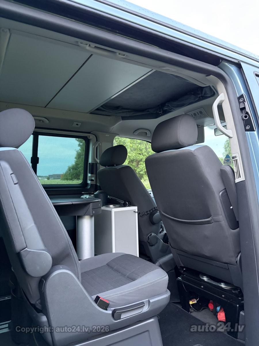 Zils Volkswagen Multivan 2007 Tartu, ar dzinēja tilpumu 2.50 L un nobraukumu 354 tūkst. km par 13000 €, foto 28 vietnē AUTOMOTO.COM.LV