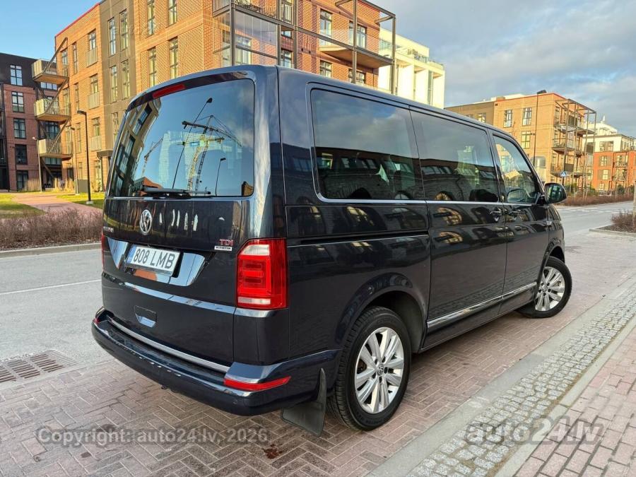 Blue Volkswagen Multivan 2016 in Tallinn, with an engine capacity of 2.00 L and mileage of 228 thousand km for 24999 €, photo 12 on AUTOMOTO.COM.LV