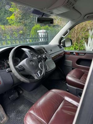 Brown Volkswagen Multivan 2012 in Vilnius, with an engine capacity of 2.00 L and mileage of 350 thousand km for 14700 €, photo 7 on AUTOMOTO.COM.LV
