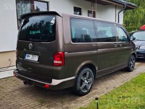 Brown Volkswagen Multivan 2010 in Riga, with an engine capacity of 2.00 L and mileage of 408 thousand km for 11110 €, photo 5 on AUTOMOTO.COM.LV