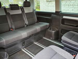 Brown Volkswagen Multivan 2010 in Riga, with an engine capacity of 2.00 L and mileage of 408 thousand km for 11110 €, photo 8 on AUTOMOTO.COM.LV