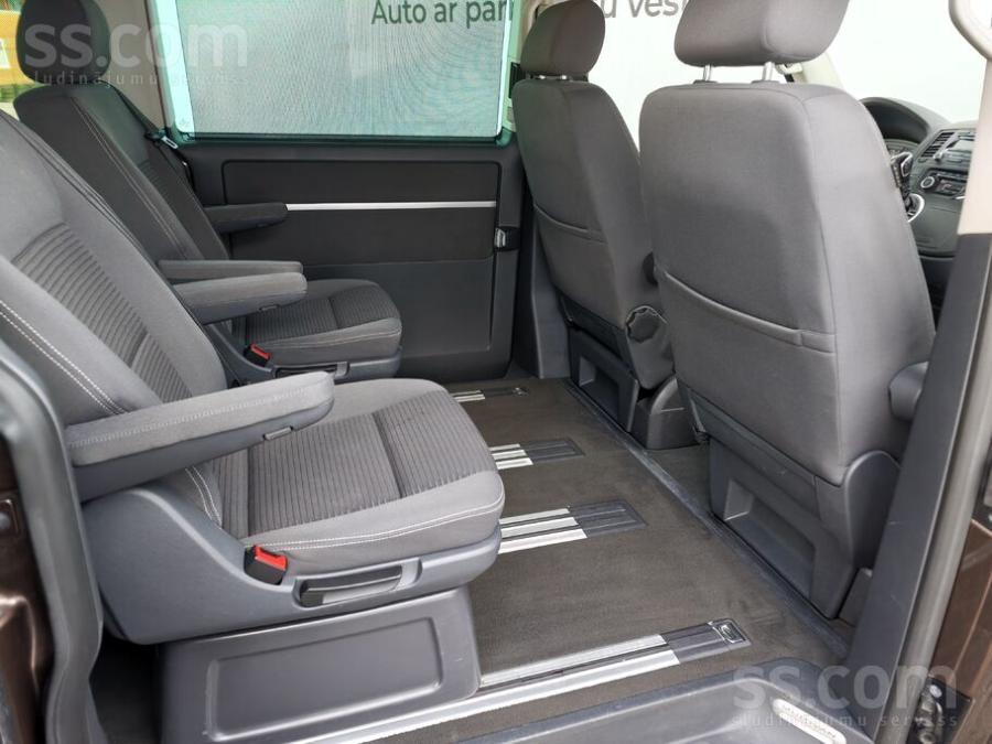 Brown Volkswagen Multivan 2010 in Riga, with an engine capacity of 2.00 L and mileage of 230 thousand km for 11900 €, photo 16 on AUTOMOTO.COM.LV