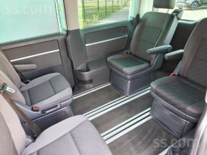 Brown Volkswagen Multivan 2010 in Riga, with an engine capacity of 2.00 L and mileage of 230 thousand km for 11900 €, photo 18 on AUTOMOTO.COM.LV
