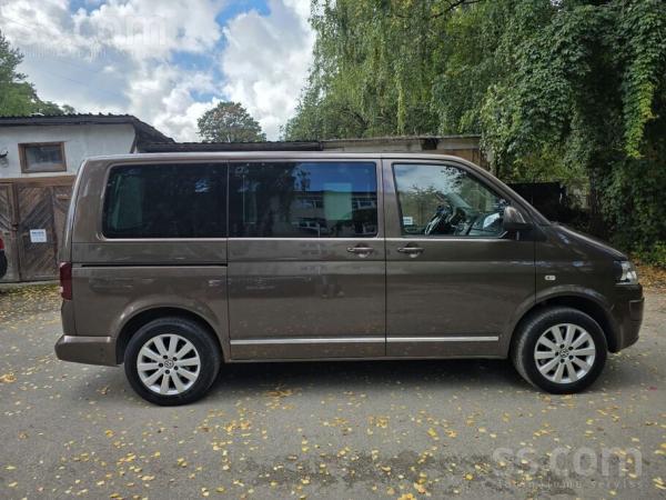 Brown Volkswagen Multivan 2010 in Riga, with an engine capacity of 2.00 L and mileage of 232 thousand km for 14500 €, photo 4 on AUTOMOTO.COM.LV