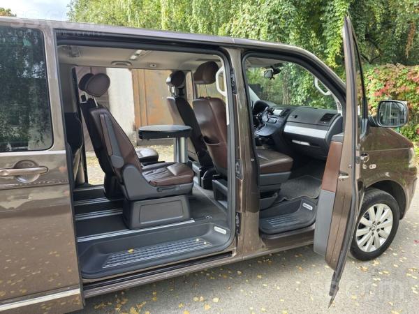 Brown Volkswagen Multivan 2010 in Riga, with an engine capacity of 2.00 L and mileage of 232 thousand km for 14500 €, photo 7 on AUTOMOTO.COM.LV