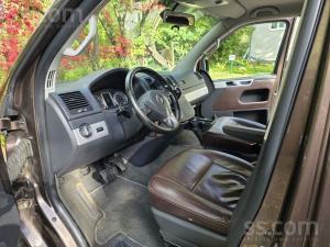 Brūns Volkswagen Multivan 2010 Rīga, ar dzinēja tilpumu 2.00 L un nobraukumu 232 tūkst. km par 14500 €, foto 8 vietnē AUTOMOTO.COM.LV