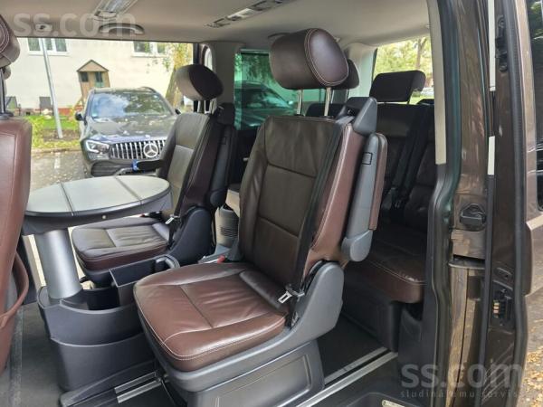 Brown Volkswagen Multivan 2010 in Riga, with an engine capacity of 2.00 L and mileage of 232 thousand km for 14500 €, photo 9 on AUTOMOTO.COM.LV