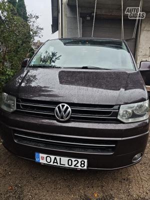 Brūns Volkswagen Multivan 2011 Vievis, ar dzinēja tilpumu 2.00 L un nobraukumu 381 tūkst. km par 16000 €, foto 7 vietnē AUTOMOTO.COM.LV