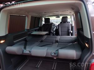 Brown Volkswagen Multivan 2010 in Liepaja, with an engine capacity of 2.00 L and mileage of 171 thousand km for 14450 €, photo 18 on AUTOMOTO.COM.LV