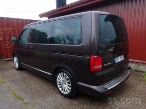 Brown Volkswagen Multivan 2010 in Liepaja, with an engine capacity of 2.00 L and mileage of 221 thousand km for 14550 €, photo 4 on AUTOMOTO.COM.LV