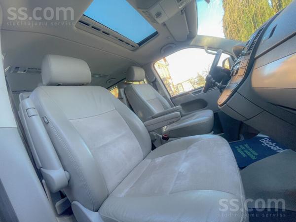 Brown Volkswagen Multivan 2011 in Jelgava, with an engine capacity of 2.00 L and mileage of 210 thousand km for 14996 €, photo 8 on AUTOMOTO.COM.LV