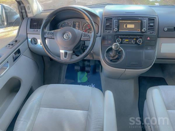 Brown Volkswagen Multivan 2011 in Jelgava, with an engine capacity of 2.00 L and mileage of 210 thousand km for 14996 €, photo 9 on AUTOMOTO.COM.LV