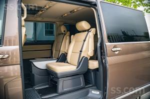 Brown Volkswagen Multivan 2013 in Riga, with an engine capacity of 2.00 L and mileage of 150 thousand km for 21990 €, photo 9 on AUTOMOTO.COM.LV