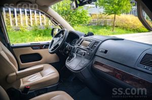 Brown Volkswagen Multivan 2013 in Riga, with an engine capacity of 2.00 L and mileage of 150 thousand km for 21990 €, photo 18 on AUTOMOTO.COM.LV