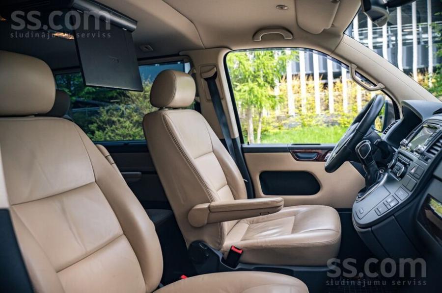 Brown Volkswagen Multivan 2013 in Riga, with an engine capacity of 2.00 L and mileage of 150 thousand km for 21990 €, photo 19 on AUTOMOTO.COM.LV