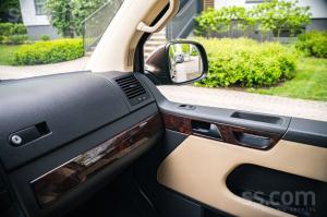 Brown Volkswagen Multivan 2013 in Riga, with an engine capacity of 2.00 L and mileage of 150 thousand km for 21990 €, photo 28 on AUTOMOTO.COM.LV