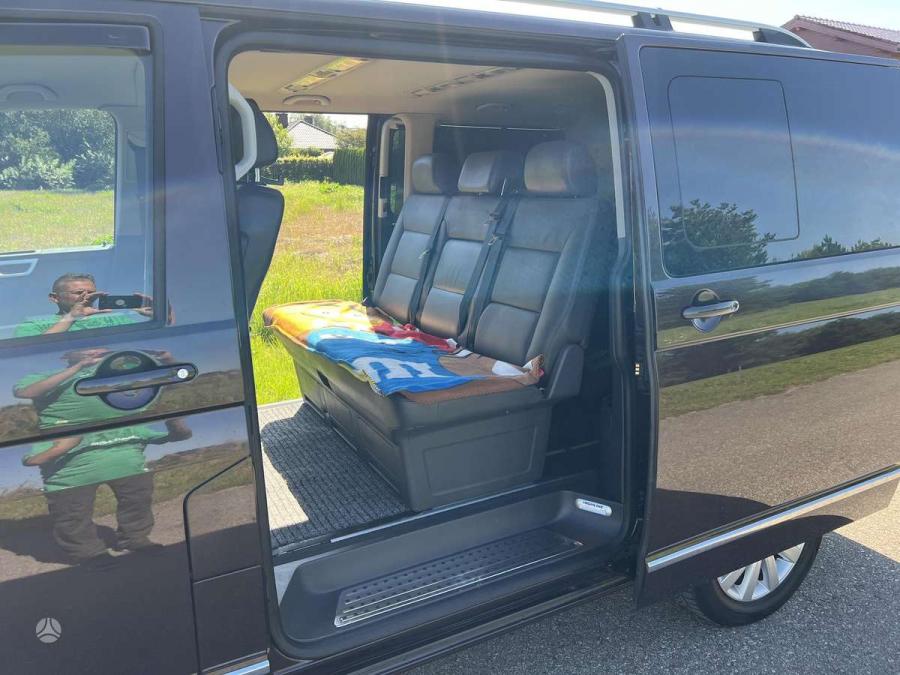 Brown Volkswagen Multivan 2013 in Kaunas, with an engine capacity of 1.97 L and mileage of 305 thousand km for 19500 €, photo 5 on AUTOMOTO.COM.LV