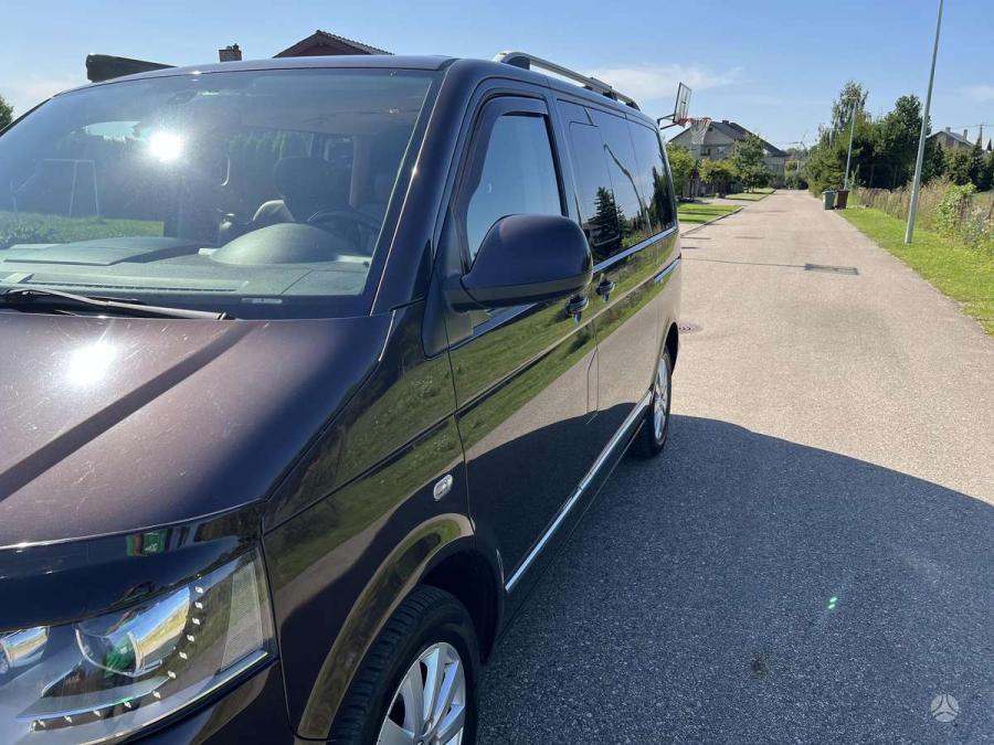 Brown Volkswagen Multivan 2013 in Kaunas, with an engine capacity of 1.97 L and mileage of 305 thousand km for 19500 €, photo 11 on AUTOMOTO.COM.LV
