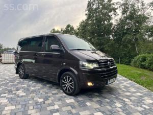 Brown Volkswagen Multivan 2015 in Jelgava, with an engine capacity of 2.00 L and mileage of 385 thousand km for 16900 €, photo 6 on AUTOMOTO.COM.LV