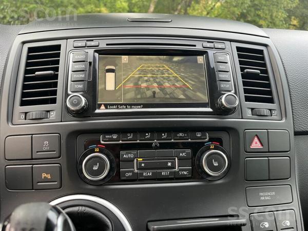 Brown Volkswagen Multivan 2015 in Jelgava, with an engine capacity of 2.00 L and mileage of 385 thousand km for 16900 €, photo 7 on AUTOMOTO.COM.LV