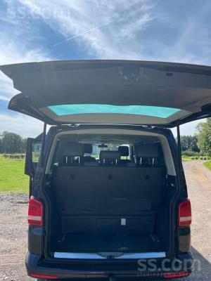 Brown Volkswagen Multivan 2015 in Jelgava, with an engine capacity of 2.00 L and mileage of 385 thousand km for 16900 €, photo 12 on AUTOMOTO.COM.LV