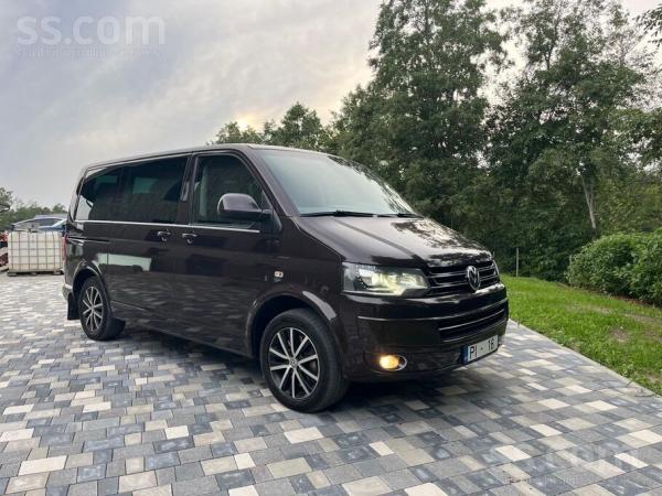 Brown Volkswagen Multivan 2015 in Jelgava, with an engine capacity of 2.00 L and mileage of 385 thousand km for 16900 €, photo 6 on AUTOMOTO.COM.LV