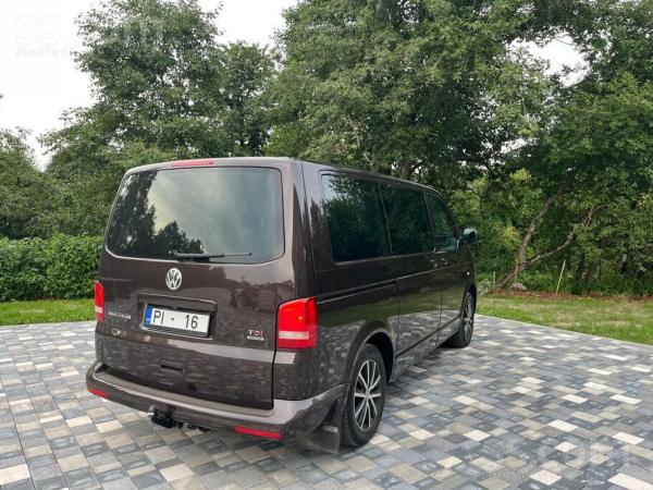 Brown Volkswagen Multivan 2015 in Jelgava, with an engine capacity of 2.00 L and mileage of 385 thousand km for 16900 €, photo 11 on AUTOMOTO.COM.LV