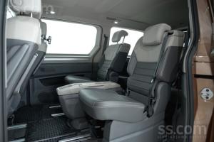 Brown Volkswagen Multivan 2024 in Riga, with an engine capacity of 2.00 L and mileage of 92 thousand km for 45800 €, photo 9 on AUTOMOTO.COM.LV