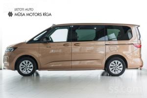 Brown Volkswagen Multivan 2024 in Riga, with an engine capacity of 2.00 L and mileage of 92 thousand km for 45800 €, photo 13 on AUTOMOTO.COM.LV