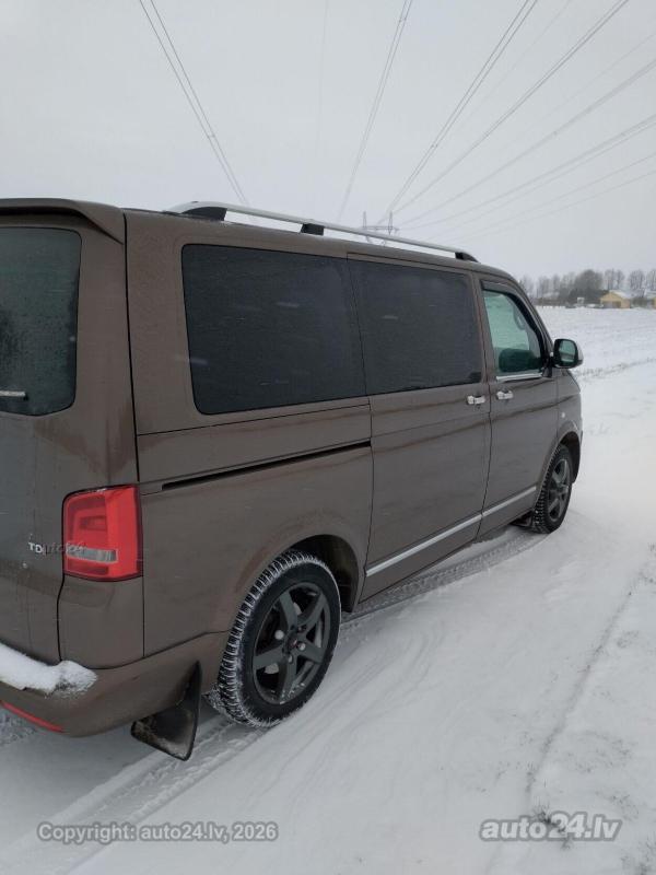 Brown Volkswagen Multivan 2014 in Tallinn, with an engine capacity of 2.00 L and mileage of 518 thousand km for 14200 €, photo 6 on AUTOMOTO.COM.LV