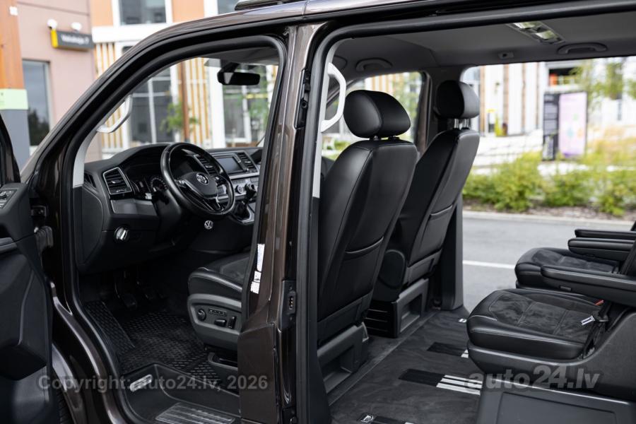 Brown Volkswagen Multivan 2016 in Tallinn, with an engine capacity of 2.00 L and mileage of 206 thousand km for 18790 €, photo 8 on AUTOMOTO.COM.LV