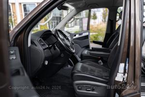 Brown Volkswagen Multivan 2016 in Tallinn, with an engine capacity of 2.00 L and mileage of 206 thousand km for 18790 €, photo 9 on AUTOMOTO.COM.LV
